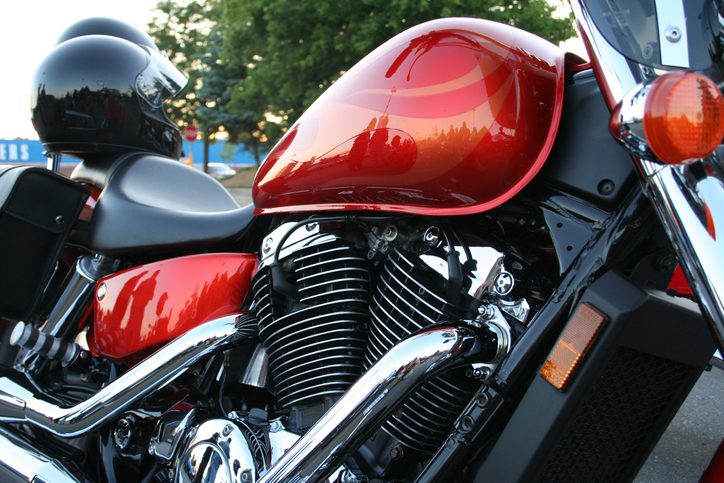 red motorcycle — American Coatings Association