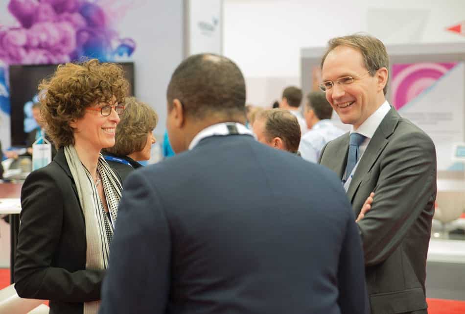 small show group chatting — American Coatings Association